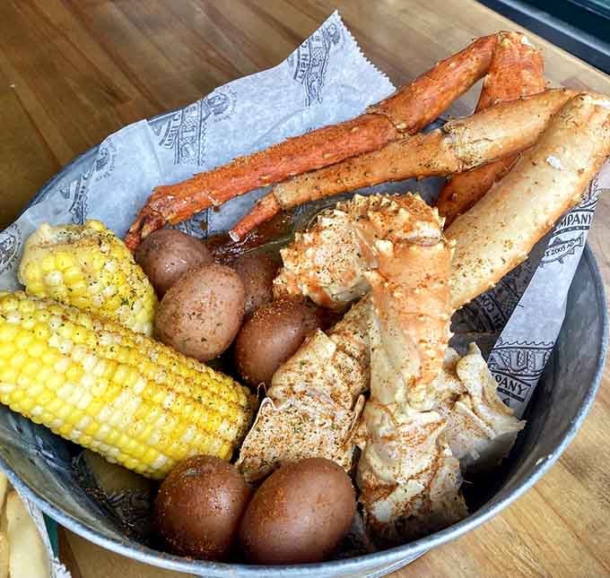 King crab legs with corn and potatoes, proving that sometimes the best meals require bibs and zero shame.