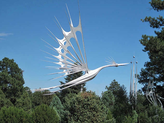 Talk about spreading your wings! This soaring bird sculpture captures the pure joy of flight in gleaming stainless steel.