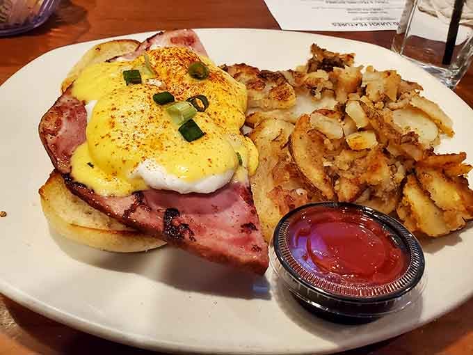 Eggs Benedict done right, with hollandaise that flows like liquid gold over perfectly poached eggs.