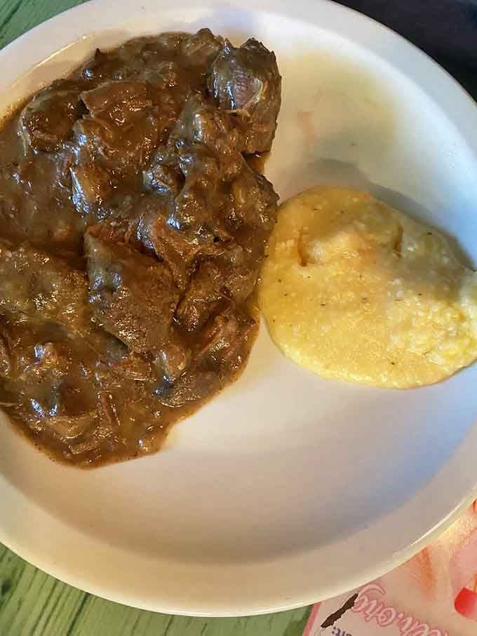 Beef tips in rich gravy with creamy grits, because sometimes breakfast for dinner is the best decision you'll make.