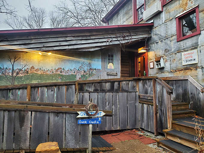 The check-in area embraces its quirky, weathered aesthetic like a badge of honor earned over 170 years.