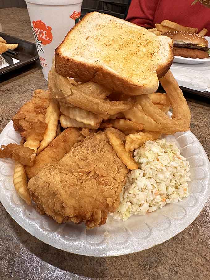 Golden fried fish with Texas toast stacked high proves that diners know how to feed people without apology or pretense.