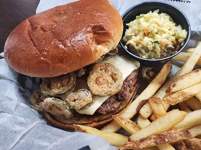 That burger's stacked higher than most superhero team rosters, with bacon and all the fixings you need.