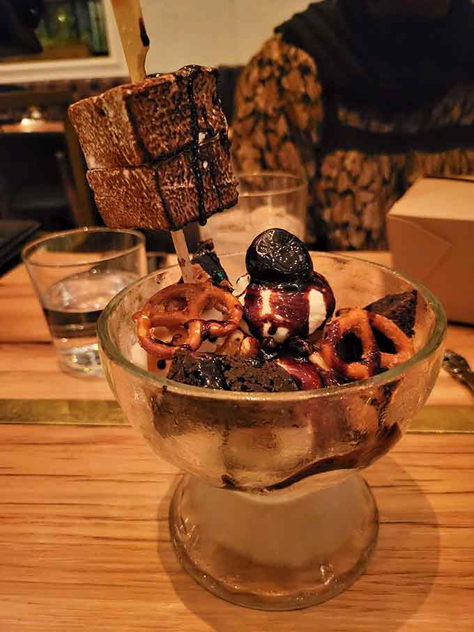 Chocolate cake on a stick hovering over ice cream is pure dessert theater, like Cirque du Soleil for your taste buds.