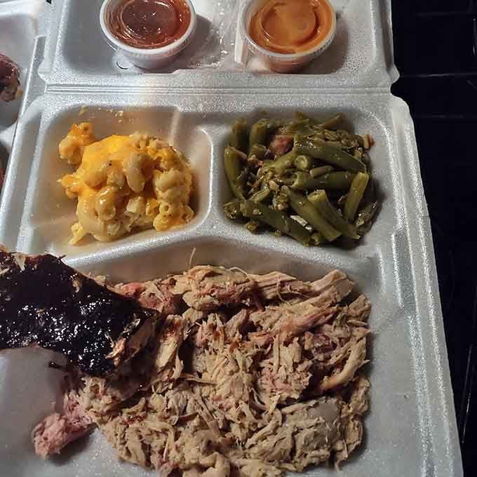 Pulled pork with that ideal mix of textures, from crispy bark to tender inside, all swimming in Carolina gold sauce.