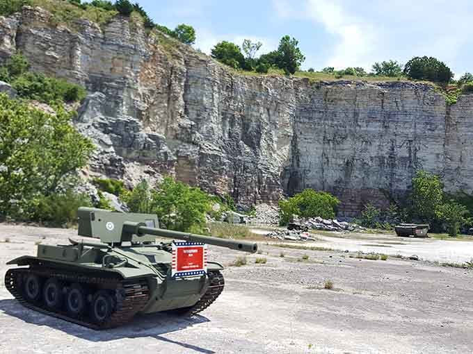 Nothing says "unexpected photo op" quite like a vintage military tank parked against dramatic limestone cliffs.