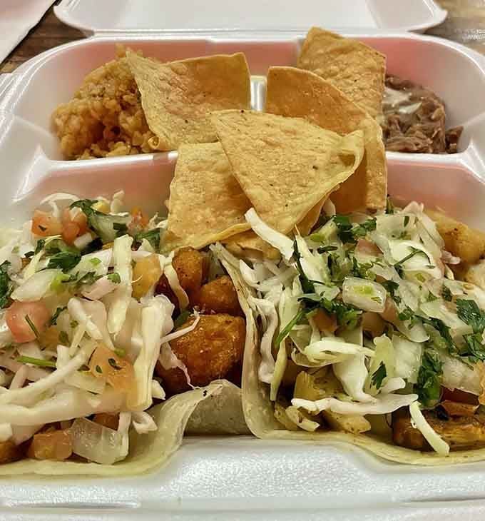 Golden tacos topped with fresh cabbage and pico de gallo prove that sometimes simplicity creates the most memorable meals.