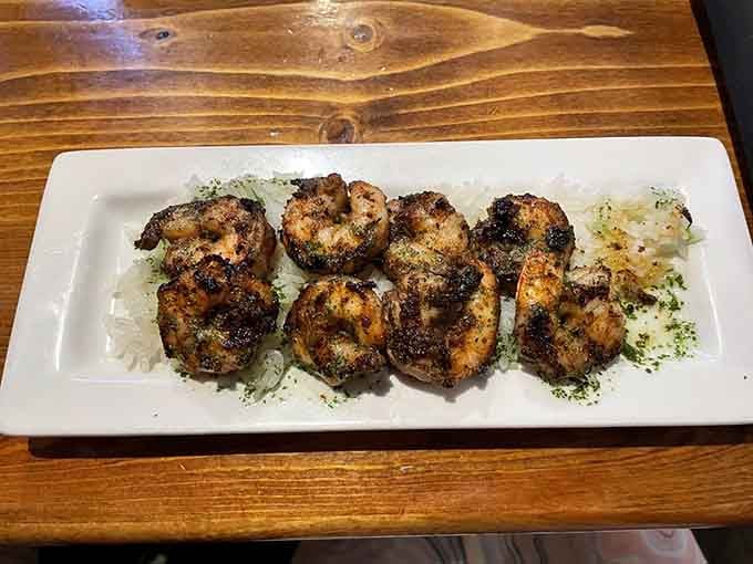 Jerk shrimp with enough char and spice to transport you straight to a Caribbean beach, minus the sunburn.
