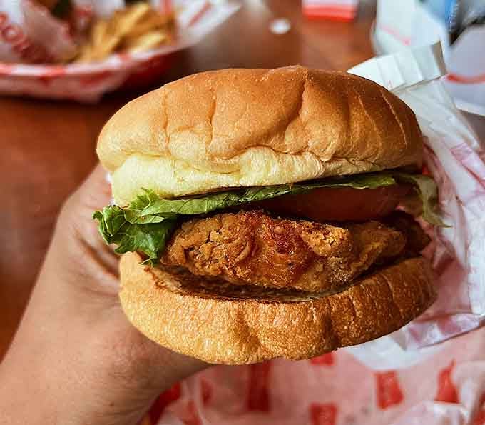 That golden-brown crust on crispy chicken nestled in a soft bun is basically edible architecture at its finest.