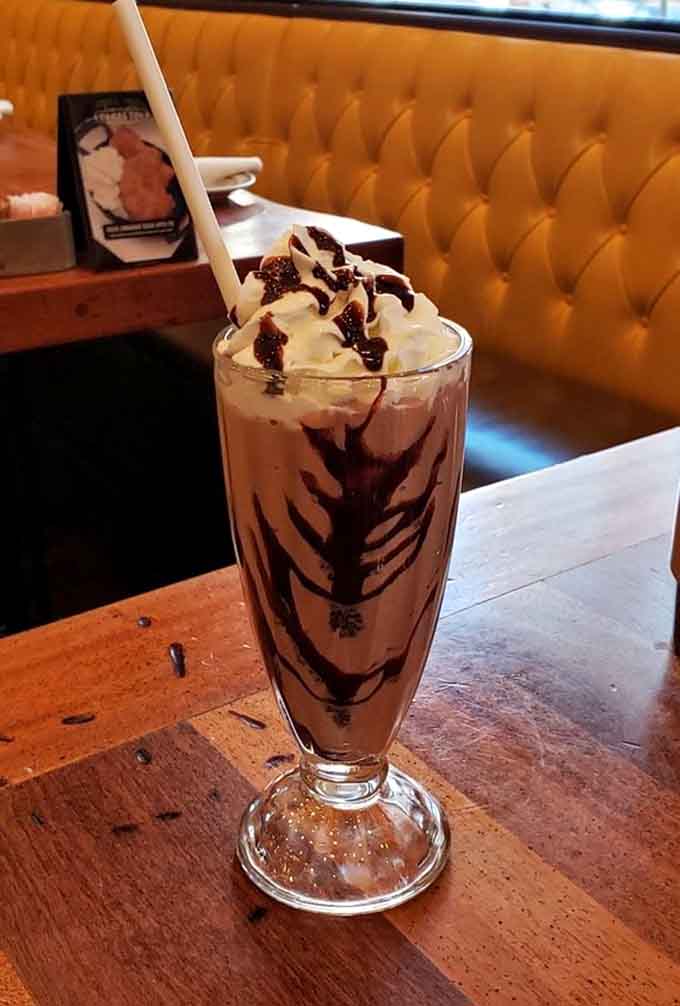 This milkshake brings all the nostalgia to the yard, complete with whipped cream and chocolate drizzle for days.