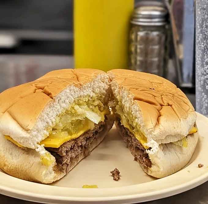 A cheeseburger so perfectly griddled it could make a grown person weep with joy and nostalgia combined.