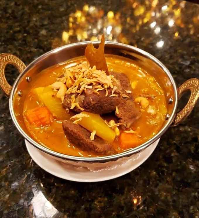 Massaman curry arrives in royal fashion, rich and aromatic enough to make your taste buds bow down.