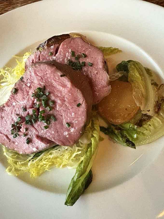 Sous vide filet sliced to reveal that perfect pink center, proving patience really is a culinary virtue worth practicing.