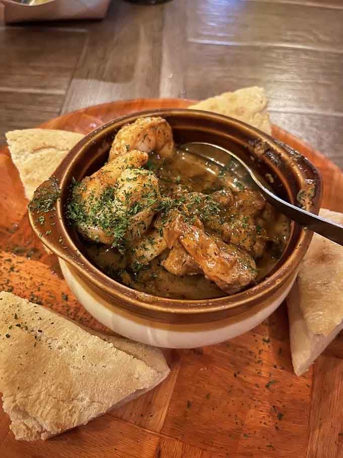 That bourbon creole sauce with tender shrimp and ciabatta bread is basically liquid gold begging you to clean the bowl.