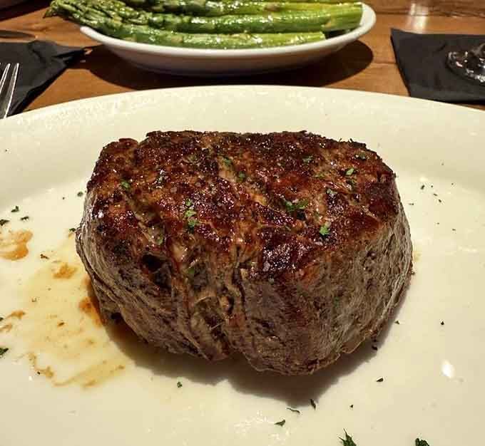 The filet mignon sits there looking tender enough to cut with a stern glance and harsh language.