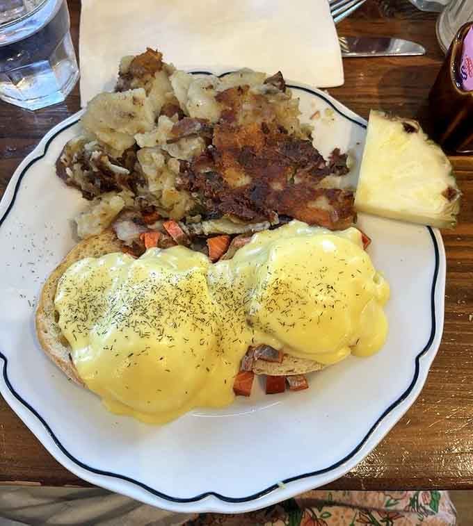 This plate proves that home fries and hollandaise can peacefully coexist in perfect breakfast harmony.
