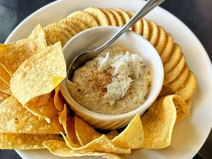 Hot crab dip surrounded by chips and crackers becomes the appetizer that launches a thousand happy sighs at your table.