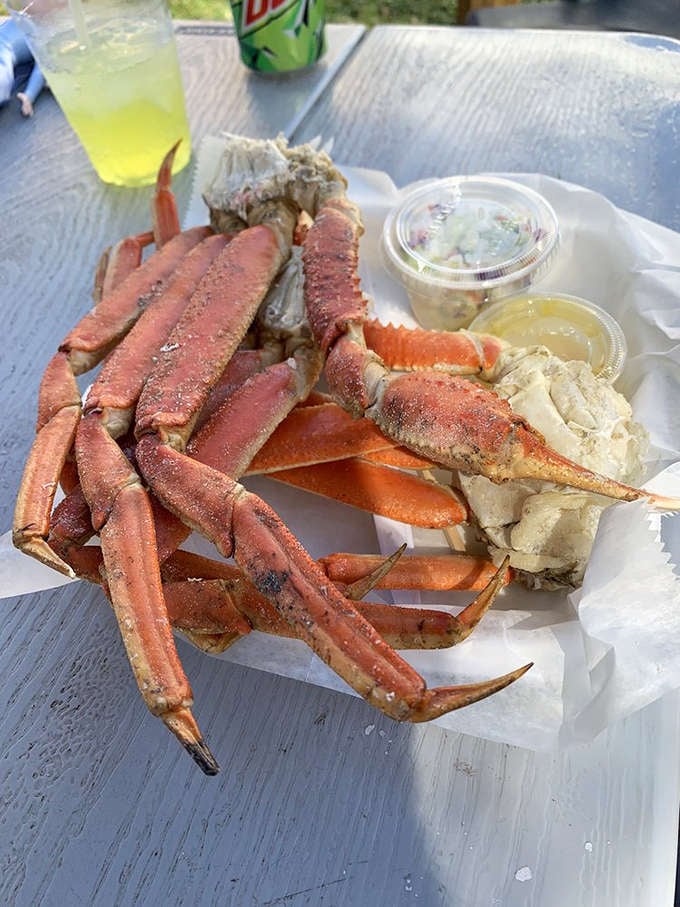 Snow crab legs sprawled across your plate like edible treasure, accompanied by all the right dipping sauces.