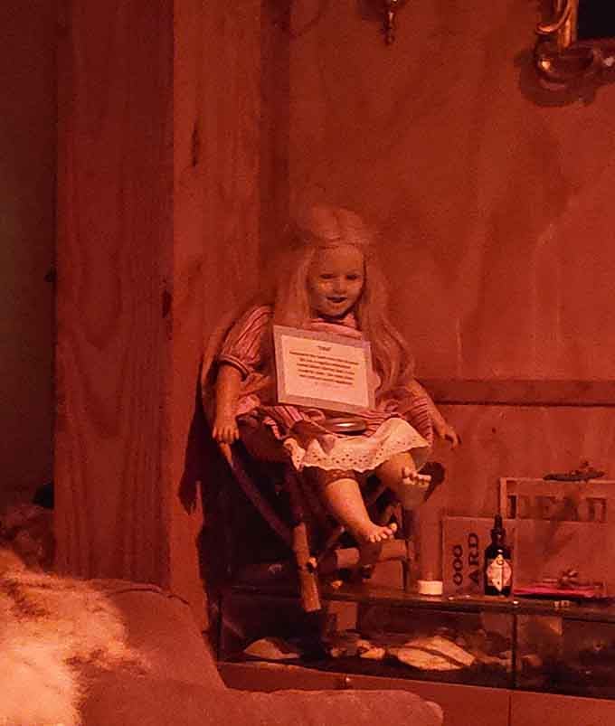 That innocent smile becomes considerably less innocent when bathed in crimson light, doesn't it?