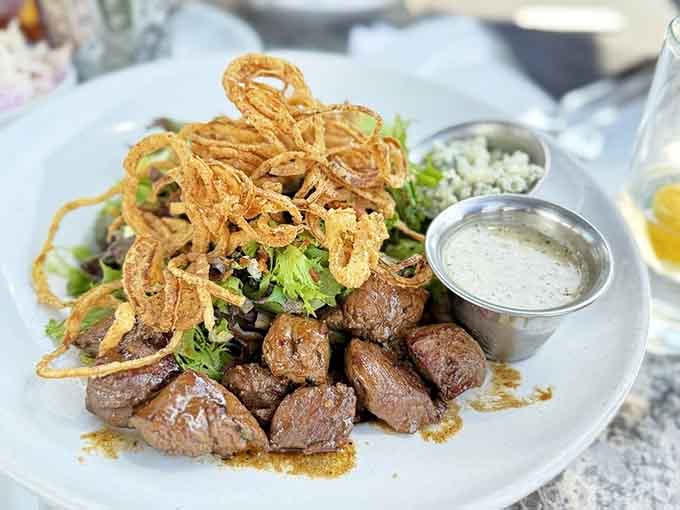 Perfectly seared steak bites topped with crispy onions prove that salads don't have to be boring punishment food.