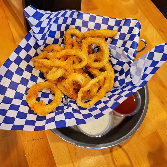 Golden calamari rings so perfectly crispy they could make even the pickiest eater reconsider their stance on squid entirely.