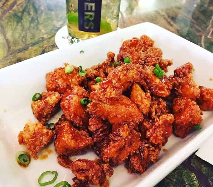 These crispy chicken bites glisten with honey whiskey glaze like edible treasure that actually tastes better than gold.