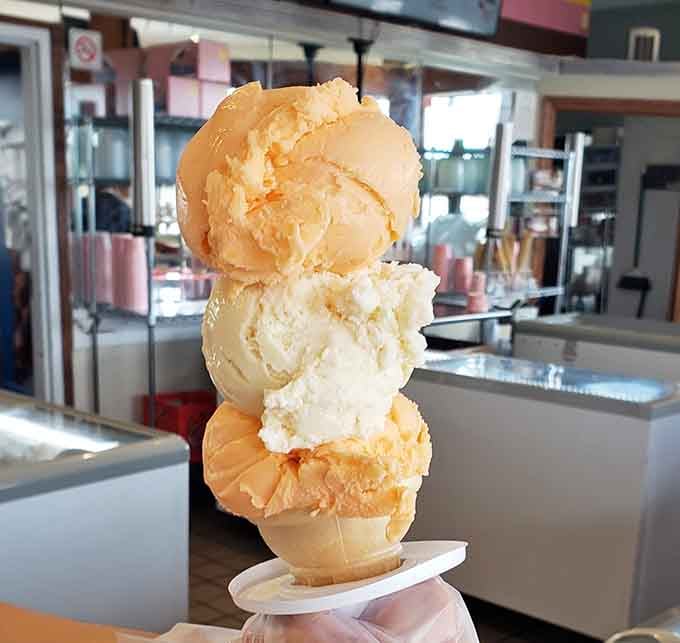 Orange sherbet scoops that look like they borrowed their color from a perfect summer sunset.