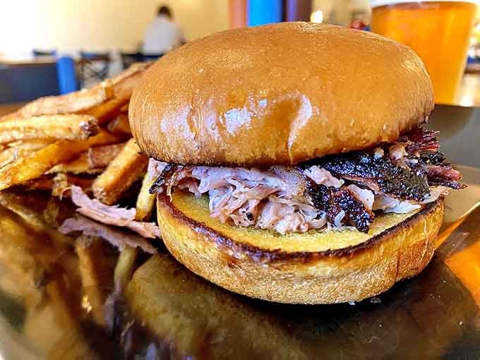 Pulled pork piled high on a toasted bun, creating the kind of sandwich dreams are made of.