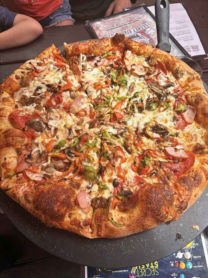 This loaded masterpiece proves that sometimes more is definitely more when it comes to pizza toppings.