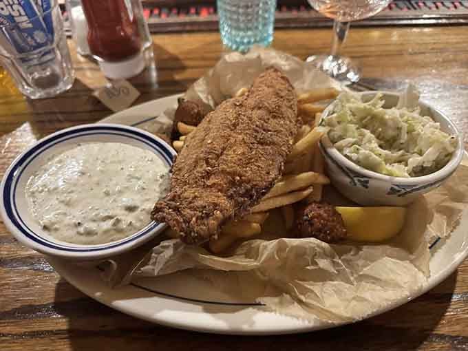 Crispy catfish that proves not all heroes wear capes, some come with coleslaw and tartar sauce instead.