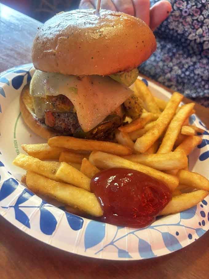 Melted cheese cascading down the sides like a delicious avalanche that nobody wants to escape from ever.