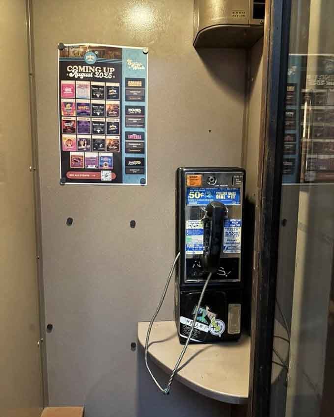 Yes, that's an actual working payphone, because sometimes you need to call 1975 and tell them you're home.