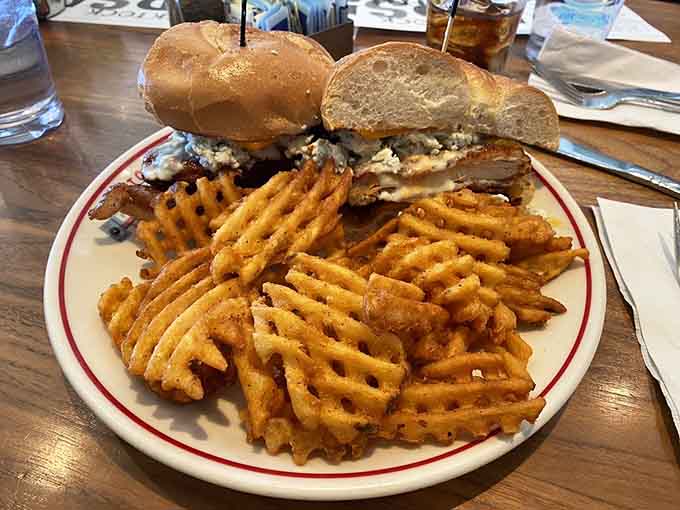Buffalo chicken stacked tall with crispy waffle fries makes you wonder why anyone orders anything remotely sensible for lunch.