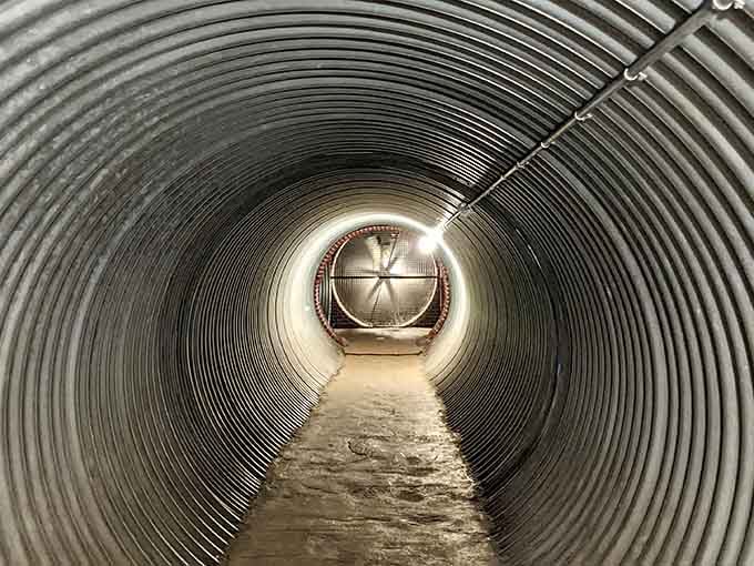 This corrugated tunnel looks like something from a Cold War bunker meets science fiction fever dream.