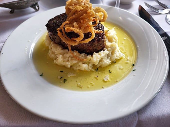 The Tousey Filet crowned with crispy onions, because sometimes a steak needs its own fancy hat.