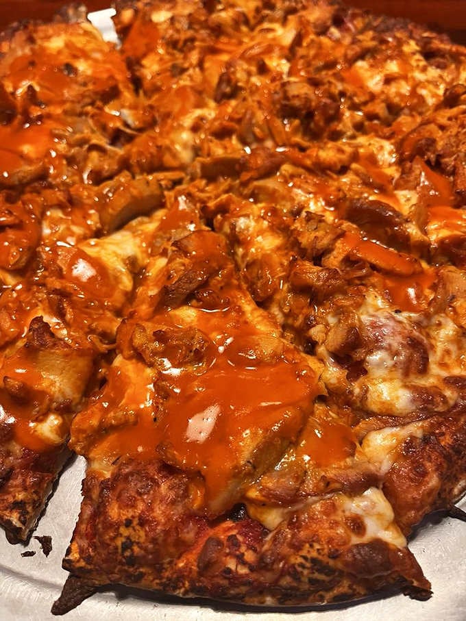 Buffalo chicken pizza brings the heat with a tangy kick that's become a local legend around these parts.