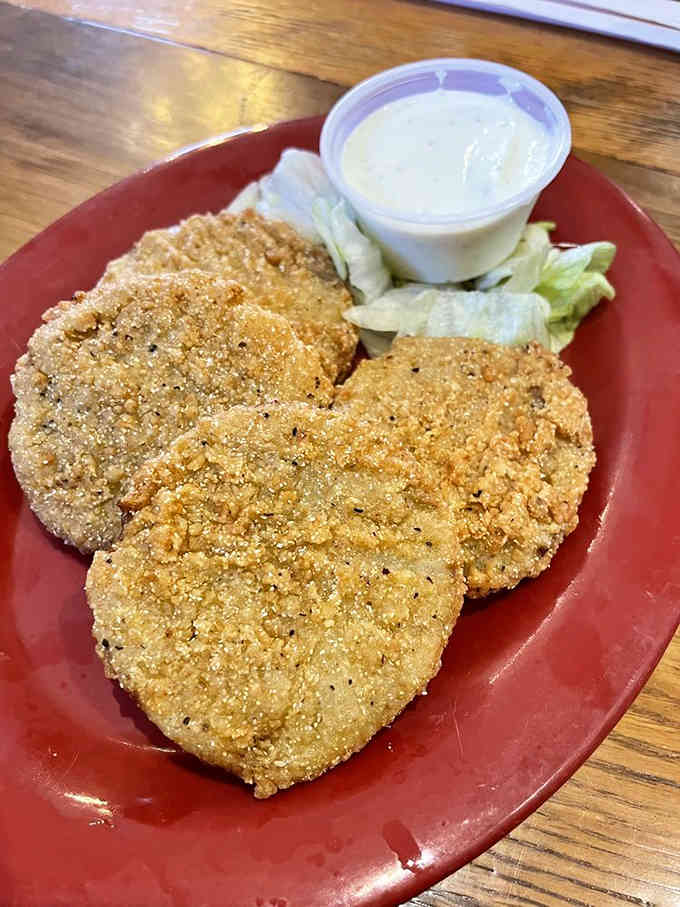 Fried green tomatoes so perfectly golden they could make a Southern grandmother weep with joy and pride.