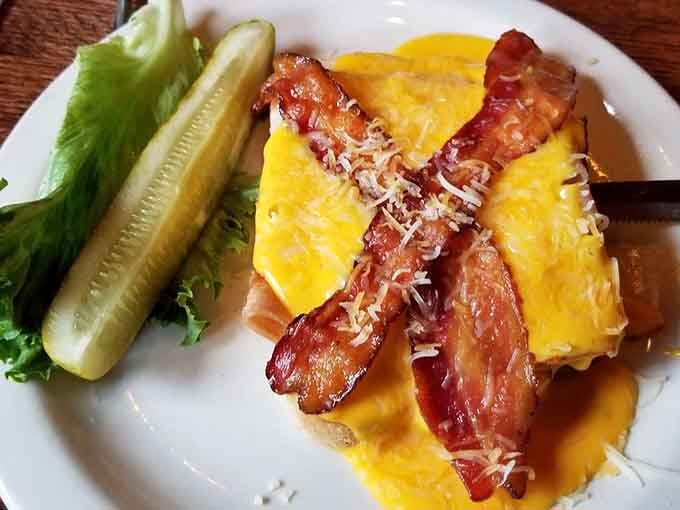 The Prosperity Sandwich stacks bacon and cheese high, making prosperity deliciously tangible and totally worth it.