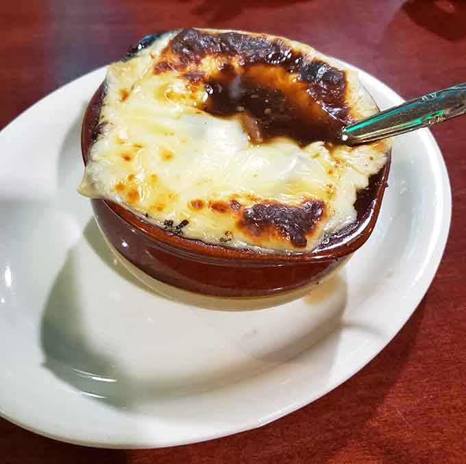 French onion soup with that gloriously melted cheese blanket is comfort in a crock, pure and simple.