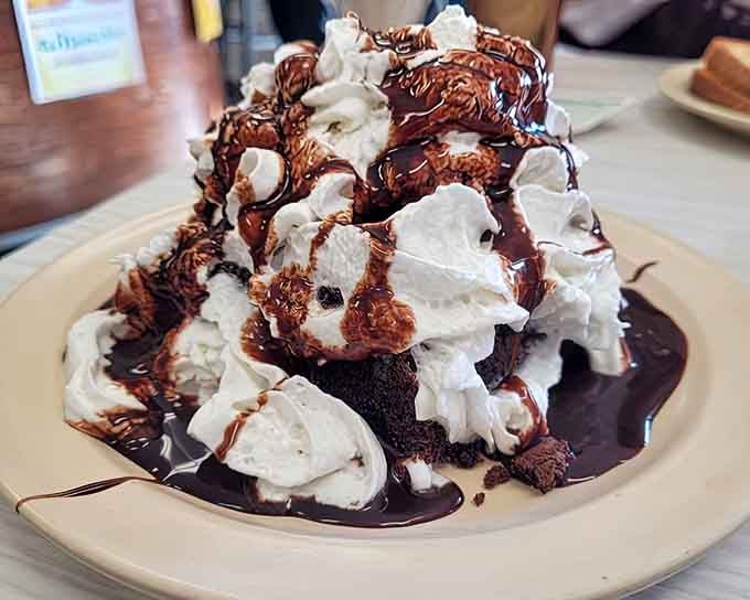This chocolate brownie creation makes you question whether dessert should come with a warning label or a medal.