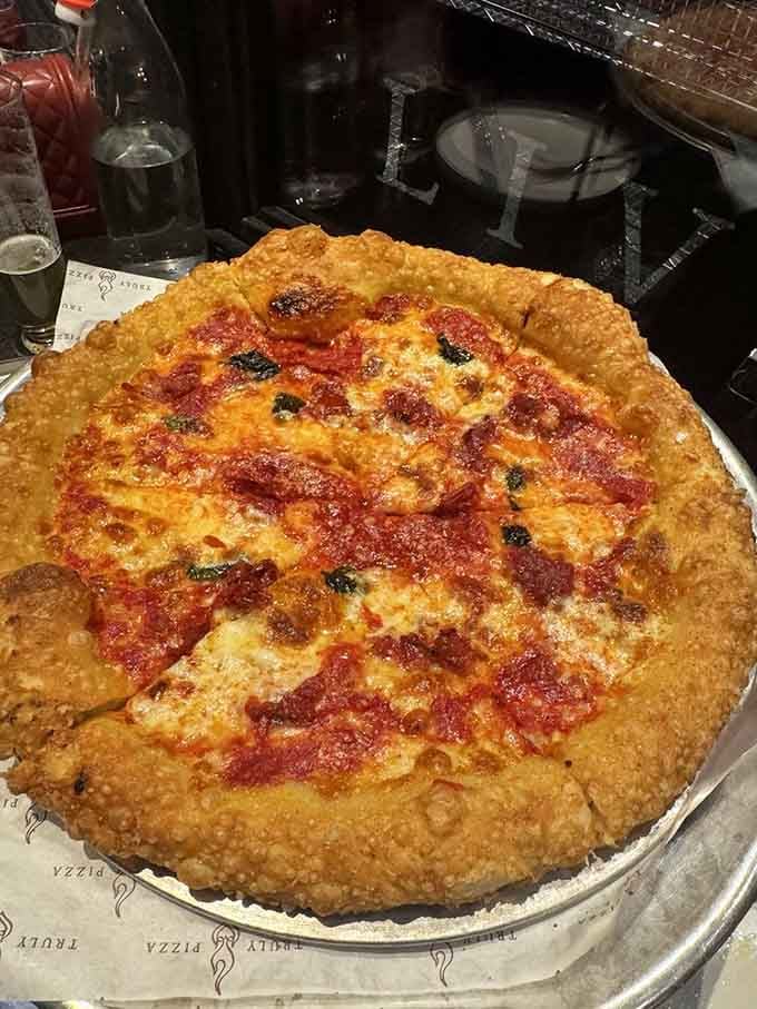 That leopard-spotted crust and bubbling cheese tells you everything you need to know about proper oven temperature and expert timing.