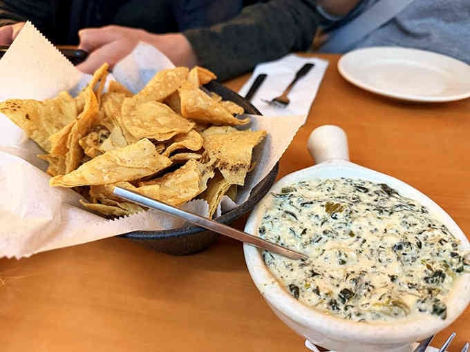 Pepper-jack creamed spinach with tortilla chips offers a surprisingly addictive start to your rib feast.