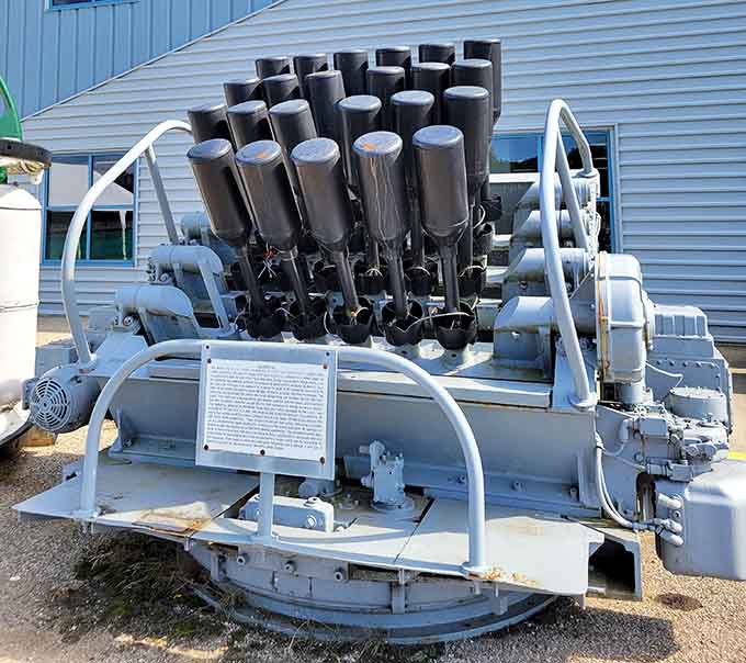 This hedgehog anti-submarine weapon system sits outside, a reminder of the era's naval firepower.