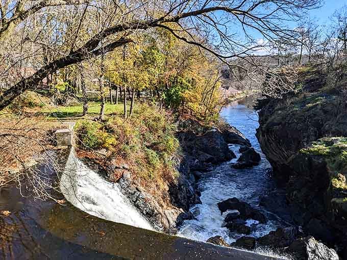 The calm before the cascade, where the river gathers itself for its dramatic plunge over the rocks.