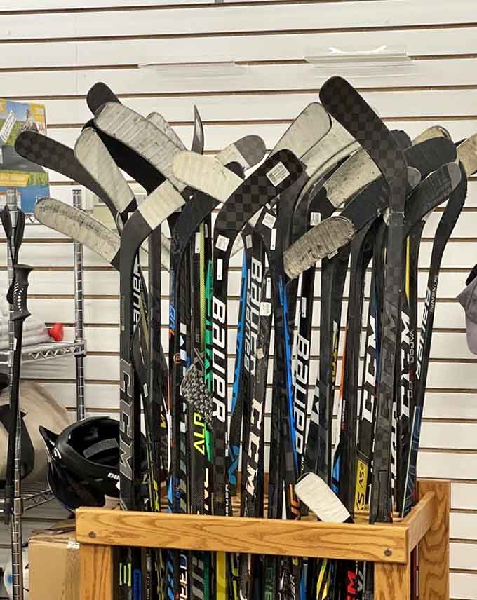 Hockey sticks stand ready for their second chance at glory, having survived the journey but lost their original owners.