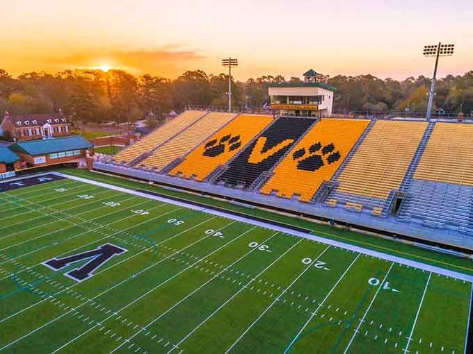 Bazemore-Hyder Stadium glows golden at sunset, proving college football in the South is practically a religious experience worth attending.