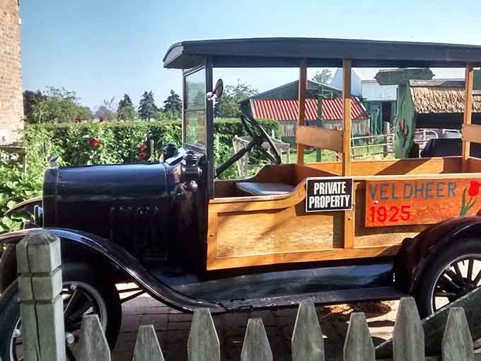 That vintage woody wagon adds nostalgic charm to an already picture-perfect scene of floral abundance and beauty.