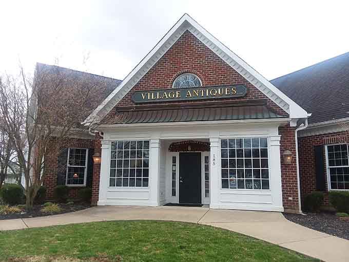 Village Antiques beckons with promises of treasures waiting to be discovered behind those welcoming doors and windows.