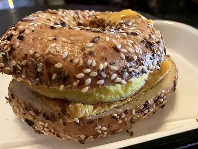 An everything bagel loaded with egg and cheese is basically a hug in sandwich form.