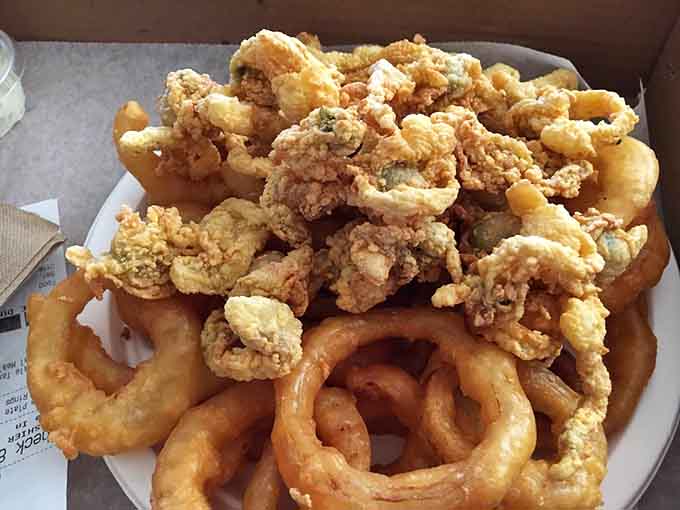 When clams and onion rings unite on one plate, it's like the Avengers of fried food.